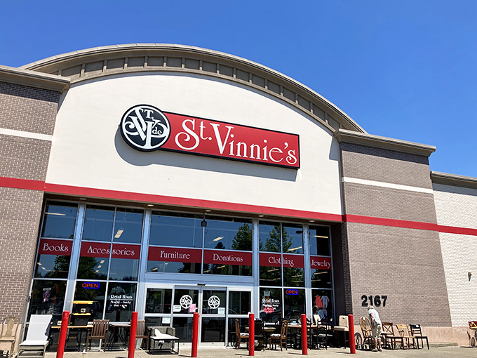 The bold red trim frames this thrifter's paradise like a picture window into a world where yesterday's treasures await new homes.