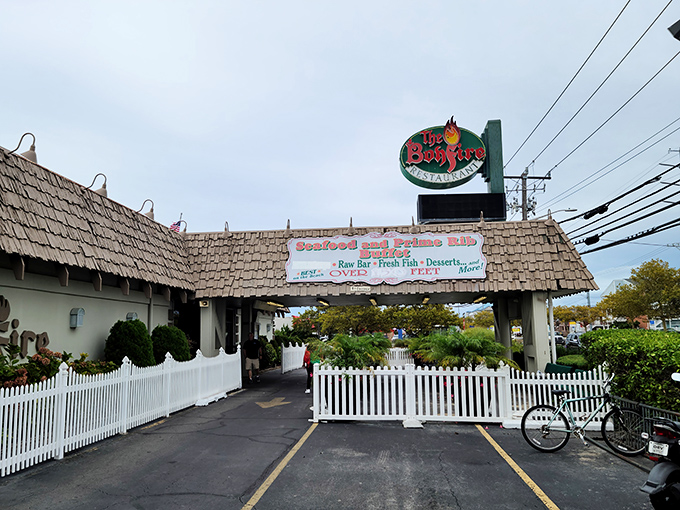 Ocean City's legendary Bonfire Restaurant stands ready for hungry beachgoers. That sign promising "100 feet of all you can eat" isn't just advertising&mdash;it's poetry to a hungry soul.