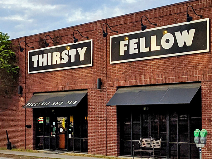 Where pizza meets pub culture in perfect harmony. Thirsty Fellow's inviting entrance promises comfort food with character.