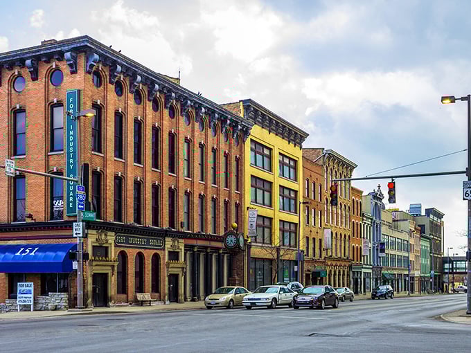 The sun casts long shadows between Toledo's impressive buildings, where affordable homes await just minutes from this vibrant downtown.