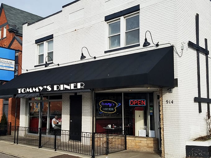 The neon "OPEN" sign is always a welcome sight. Step inside and prepare for a time-traveling culinary adventure.