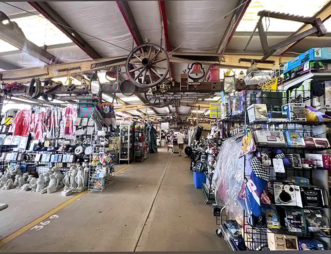 Inside Traders World, where wagon wheels hang from ceilings and memories dangle from every vendor's booth. Nostalgia sold separately!