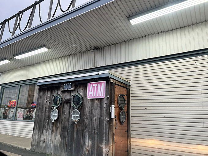 Under the Pier (ATM closeup): "Don't let the unassuming exterior fool you. Behind those nautical portholes lies seafood worth every penny in that ATM!"