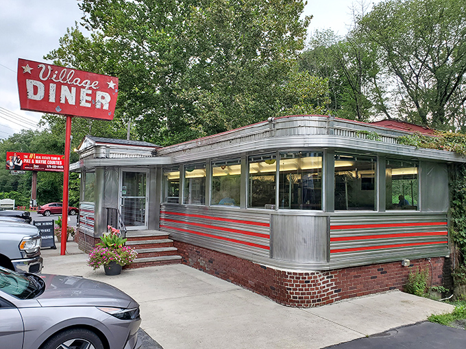 That vintage red sign has been guiding hungry travelers to comfort food heaven for decades. Some landmarks never need updating.