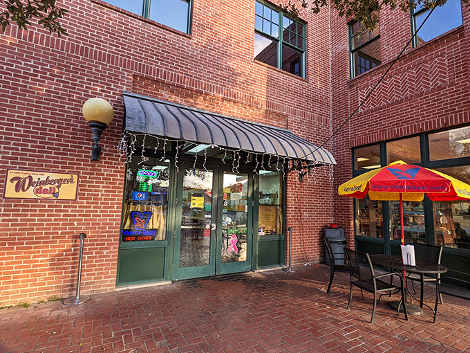 Weinberger's brick facade and yellow sign whisper "sandwich history" like an old friend inviting you in for lunch.