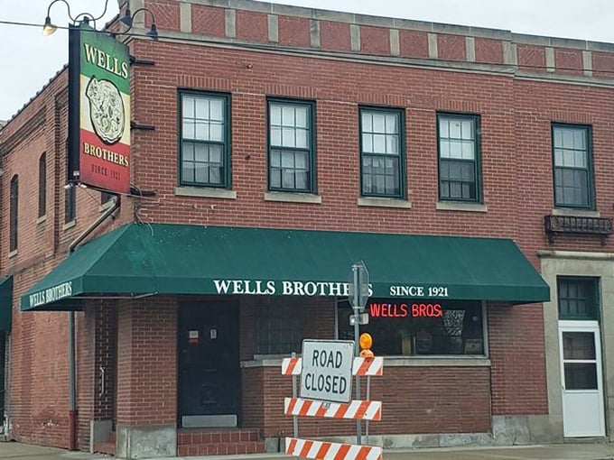 That green awning isn't just decoration &ndash; it's a beacon of hope for thin-crust lovers across Racine County.