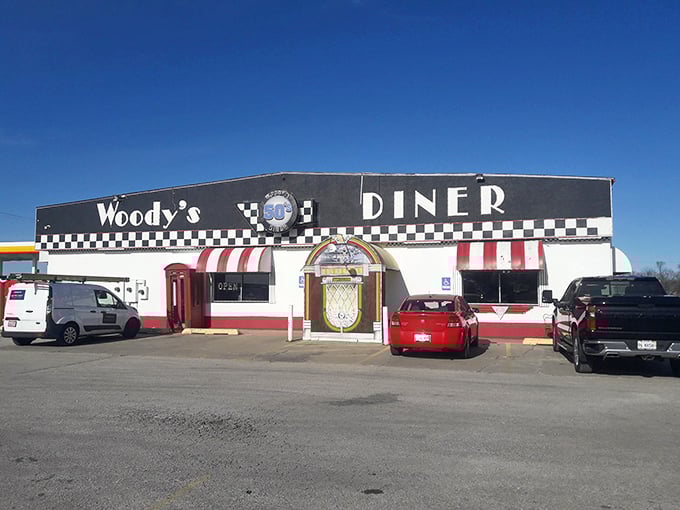 Step into Woody's and suddenly it's 1955 again. That checkered trim isn't just decoration&mdash;it's a portal to simpler times.