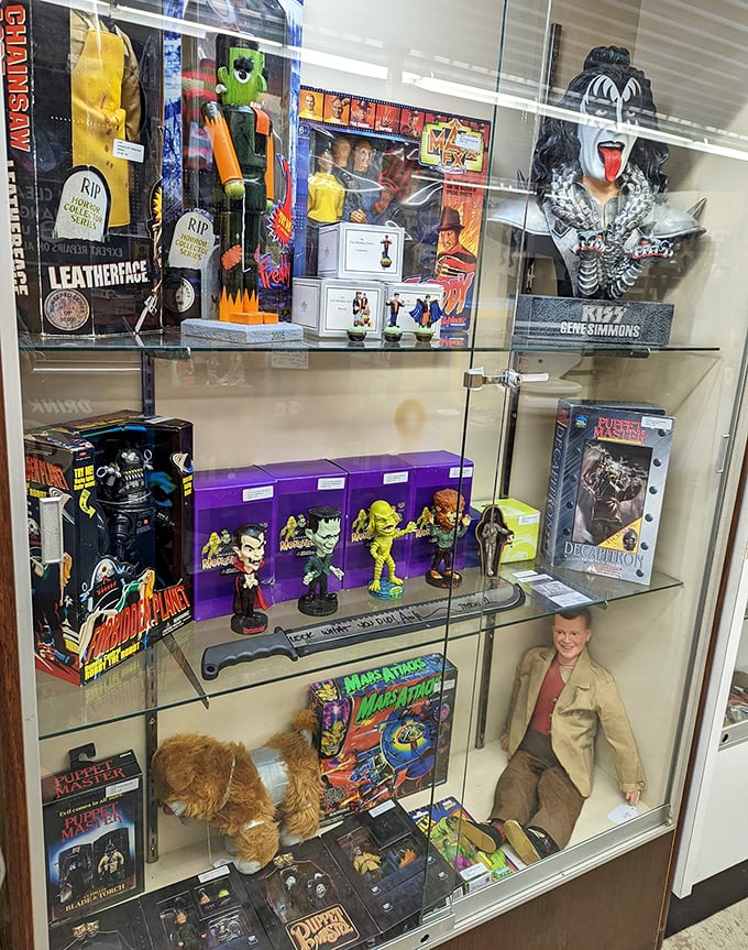 This glass case is a time machine disguised as retail space. One glance and you're eight years old again, begging mom for that KISS action figure.