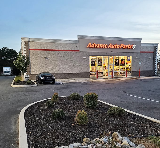 Even practical necessities like Advance Auto Parts take on a certain small-town glow at dusk, when Harrington's everyday businesses become part of its evening landscape.