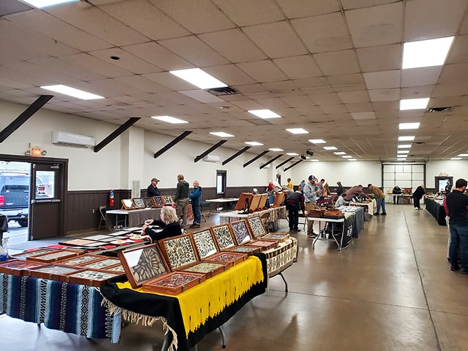 Treasure hunters browse handcrafted items in the indoor section, where one person's "I don't need that" quickly becomes "I can't live without it."