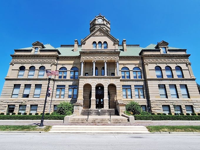 The Auglaize County Courthouse stands as a sandstone sentinel of small-town justice. Its Romanesque architecture whispers stories of bygone eras to anyone who listens.