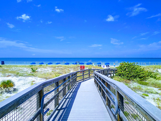 This boardwalk leads to beaches that make your neighbor's pool party look like amateur hour.