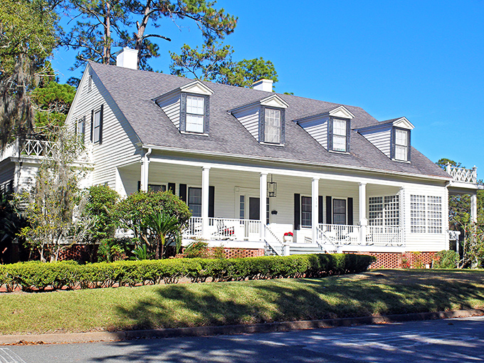 Southern living, perfected. This classic home with its sweeping porch practically begs you to sit a spell with a glass of sweet tea.