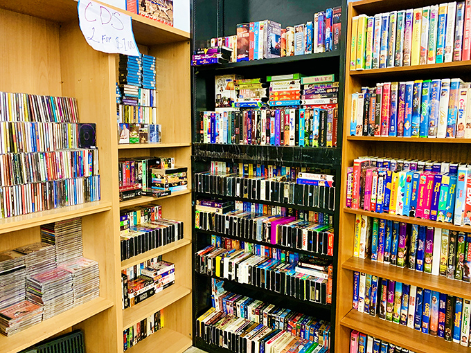 A library of nostalgia where VHS tapes and DVDs live on, proving some technologies refuse to fade quietly into the digital sunset.