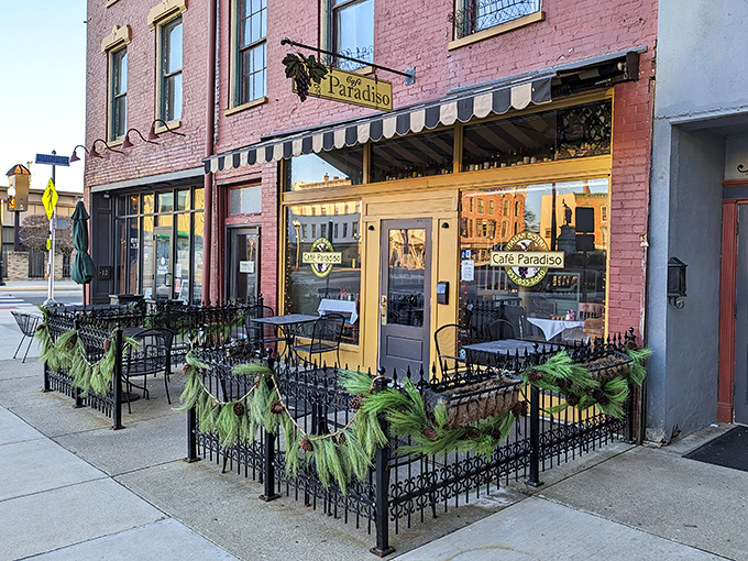 Caf&eacute; Paradiso's inviting patio practically whispers, "Stay awhile." The pink brick exterior houses coffee strong enough to power your entire retirement adventure.