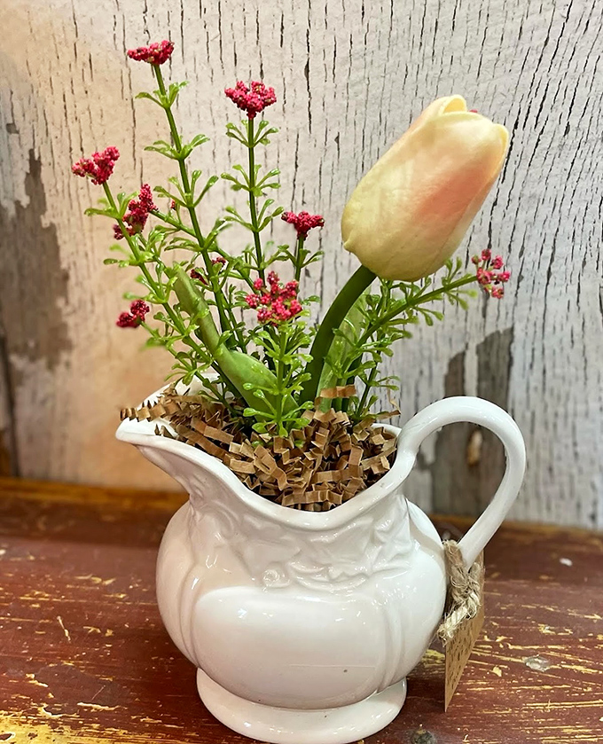 Who knew a simple white pitcher could make a single tulip look like it's having its Broadway debut? Farmhouse chic that brings the garden indoors.