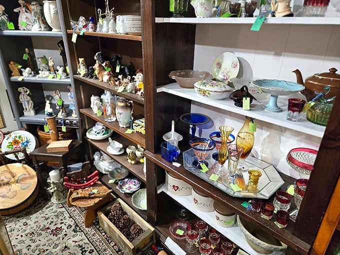 Shelves lined with delicate figurines and colorful glassware tell stories of dinner parties and special occasions from generations past.
