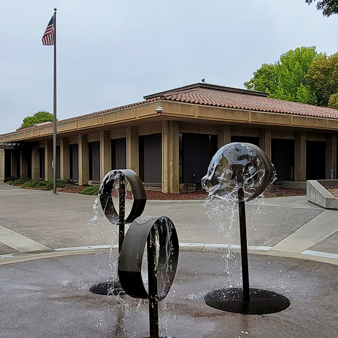City Hall's modern fountain sculpture proves even municipal buildings can have personality. Water and art combine in this peaceful civic plaza.