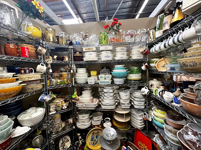 Pyrex paradise! This corner alone contains enough vintage kitchenware to send any collector into a pattern-induced fever dream of casseroles past.