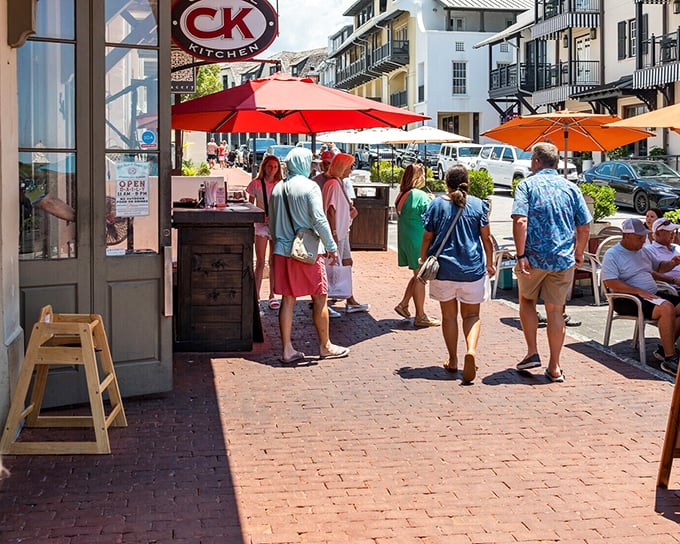 Nothing says "vacation on a budget" like outdoor dining under colorful umbrellas, where locals and visitors mingle over morning coffee and affordable treats.