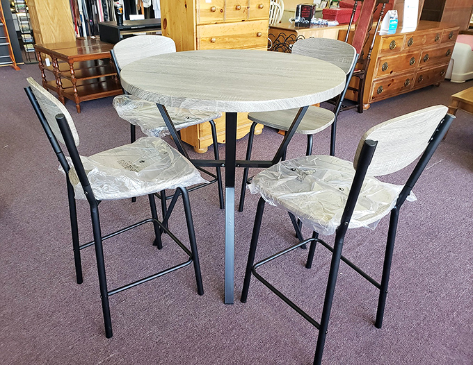 This bistro set isn't just furniture&mdash;it's the starting point for your next dinner party story. Still wrapped and ready for its second chance.