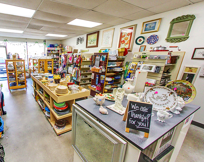 The home d&eacute;cor section is where family heirlooms and conversation pieces find second lives, complete with that "We are Thankful for You" sign that speaks volumes about the store's ethos.
