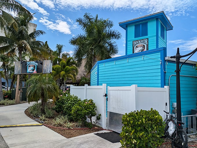 That vibrant turquoise building isn't just eye-catching&mdash;it's Dockside Waterfront Grill, where seafood tastes fresher when you can see the water it came from.