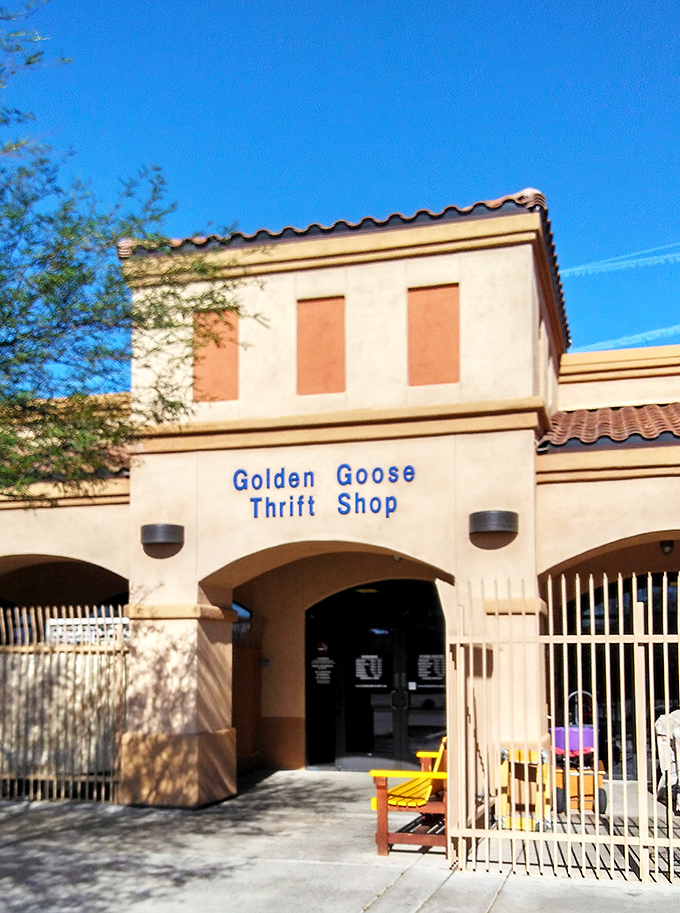 That bright yellow bench isn't just seating&mdash;it's your first clue that this thrift shop understands the value of both comfort and curb appeal.