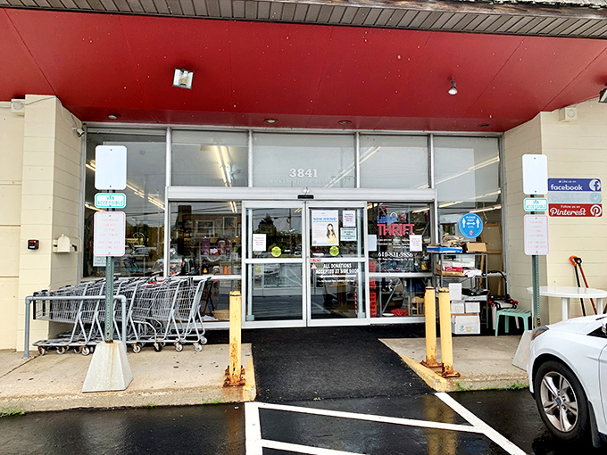 The red awning welcomes bargain hunters like a beacon, promising adventures in thrifting that big-box stores simply can't deliver.