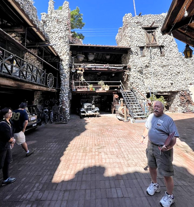 Where medieval meets modern: a courtyard that could host knights or classic cars with equal authenticity. The stone walls tell stories if you listen closely.