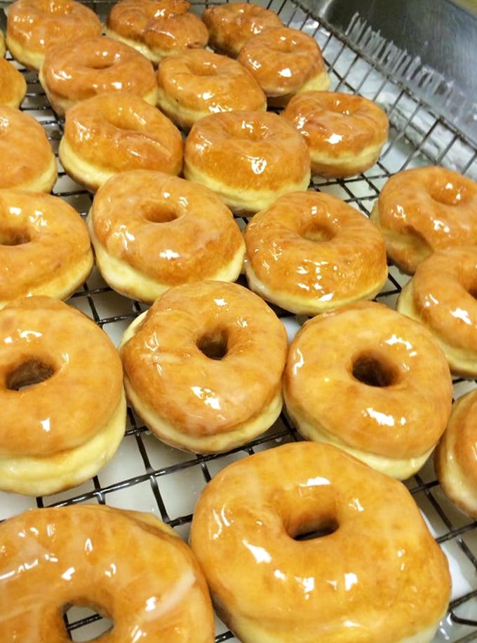 These glazed beauties aren't just donuts&mdash;they're edible sunshine with the perfect balance of airy interior and that signature crackling glaze.