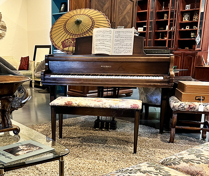 This Kimball piano isn't just furniture—it's waiting for someone to play the soundtrack to their next chapter, parasol optional.