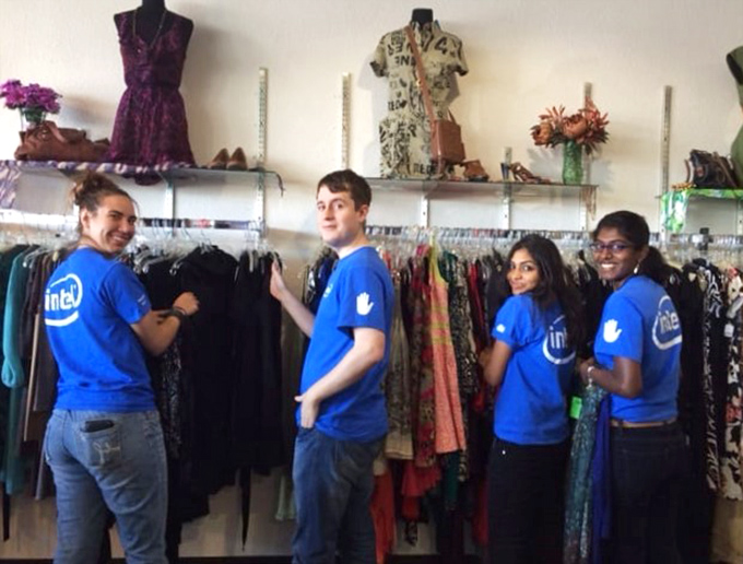 Volunteers organize racks with military precision, proving that secondhand shopping doesn't mean second-rate organization.