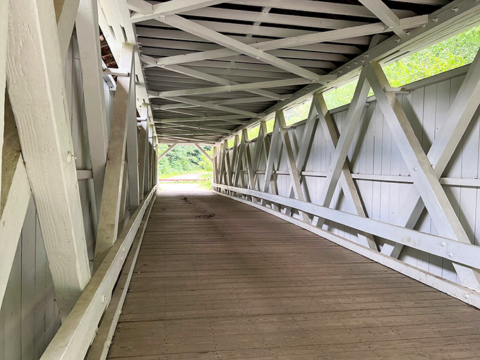 Inside reveals the true genius&mdash;a lattice truss design that's both architectural marvel and practical solution for spanning Furnace Run.