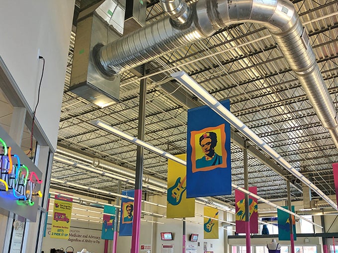 Look up and you'll spot pop art-inspired banners featuring cultural icons hanging from the industrial ceiling&mdash;a hint that this isn't your grandmother's thrift store. 