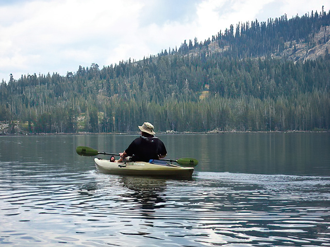 Solitude comes standard with every kayak trip on these glass-like Sierra waters, where the only traffic jam involves pine reflections competing for space.