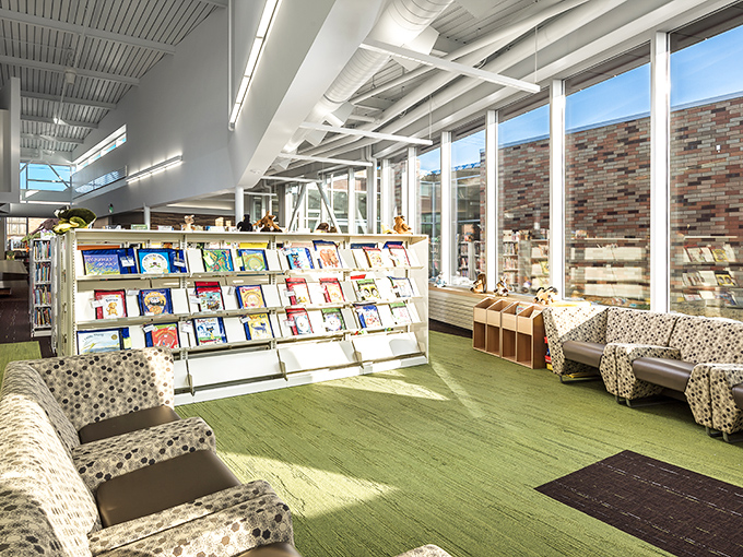 Sunlight floods this modern library space, creating the perfect spot to lose yourself in a book or pretend to read while people-watching.