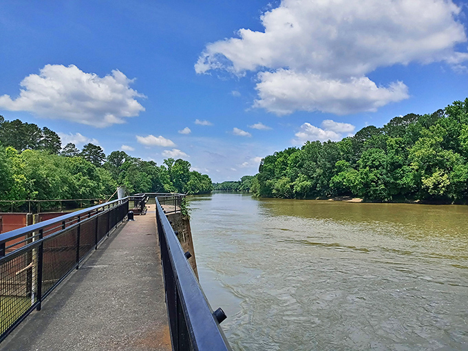 The riverfront walkway offers a front-row seat to nature's daily performance &ndash; no tickets required, just bring your appreciation for peaceful waters.