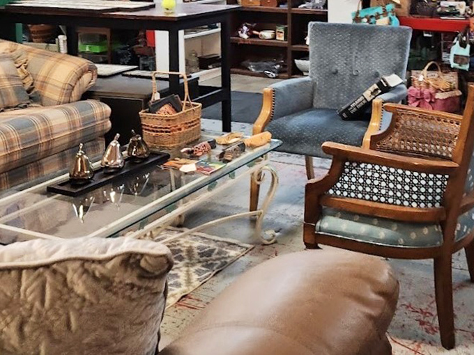Living room vignettes that tell stories of decades past. That wicker chair is practically begging you to sit down with a good book.