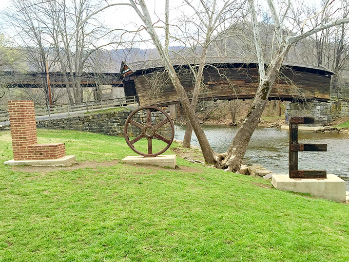 History with a side of whimsy—this rustic wheel and letter installation celebrates local heritage while giving Instagram-happy visitors the perfect photo opportunity.