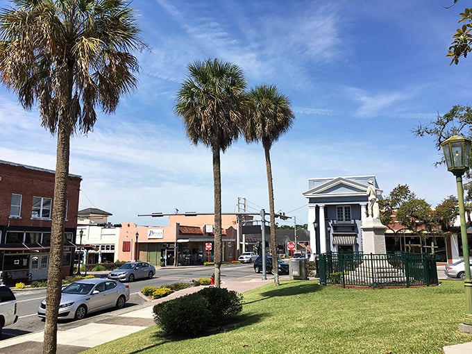 Palm trees stand sentinel over Brooksville's Main Street, where historic architecture and blue skies create postcard-perfect vistas.