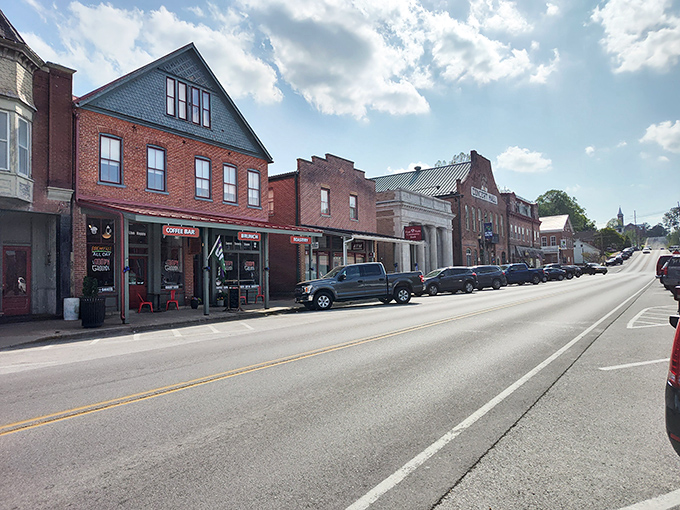 Main Street Hermann feels frozen in time, where modern cars park alongside storefronts that have witnessed over a century of American history.