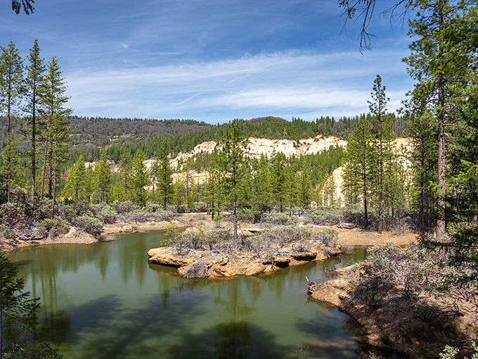 Mother Nature reclaimed the gold miners' playground at Malakoff Diggins, creating this serene pond that reflects California's complicated relationship with its treasures.