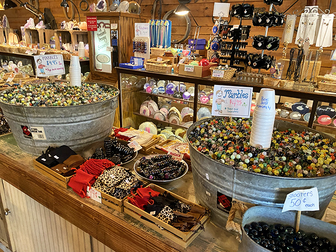 Galvanized tubs overflowing with colorful marbles that sparkle like tiny jewels begging to be collected again.