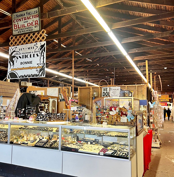 Beneath wooden beams that have witnessed decades of haggling, vendors display their wares like museum curators of everyday Americana.