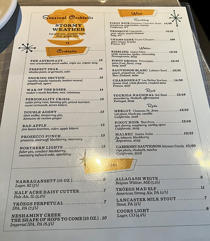 The cocktail menu reads like a passport to flavor country, with creatively named concoctions that promise liquid entertainment alongside your meal.