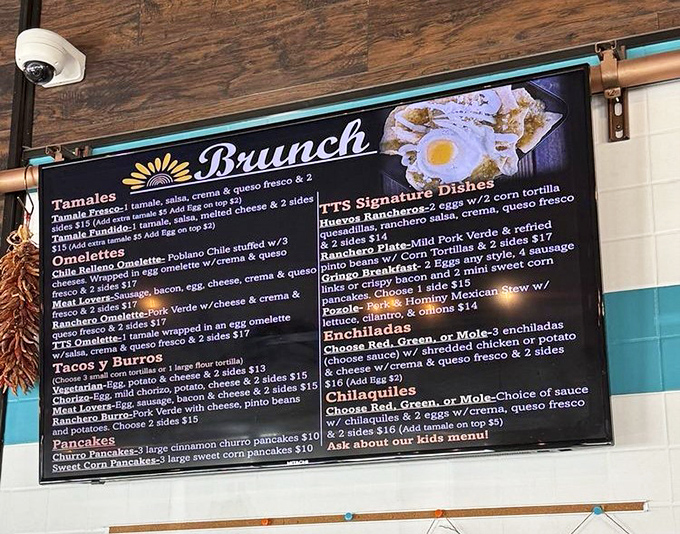 The menu board reads like a love letter to Mexican cuisine, with tamales taking center stage in this culinary romance.