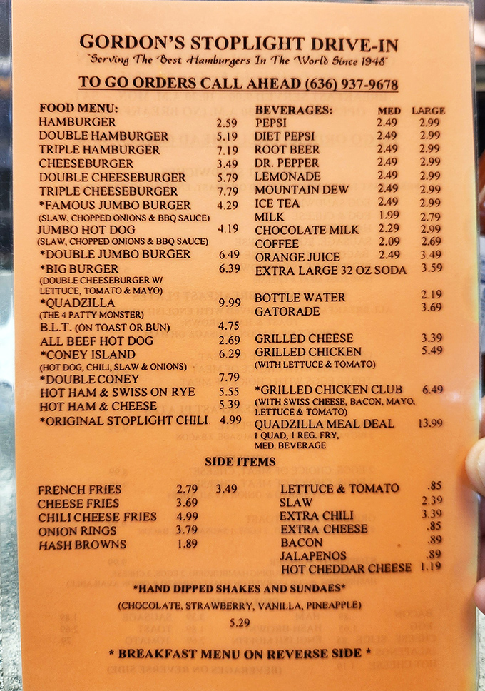 A menu that doesn't need a translator or a bank loan. The legendary Quadzilla lurks at the bottom, daring you to attempt the four-patty challenge.