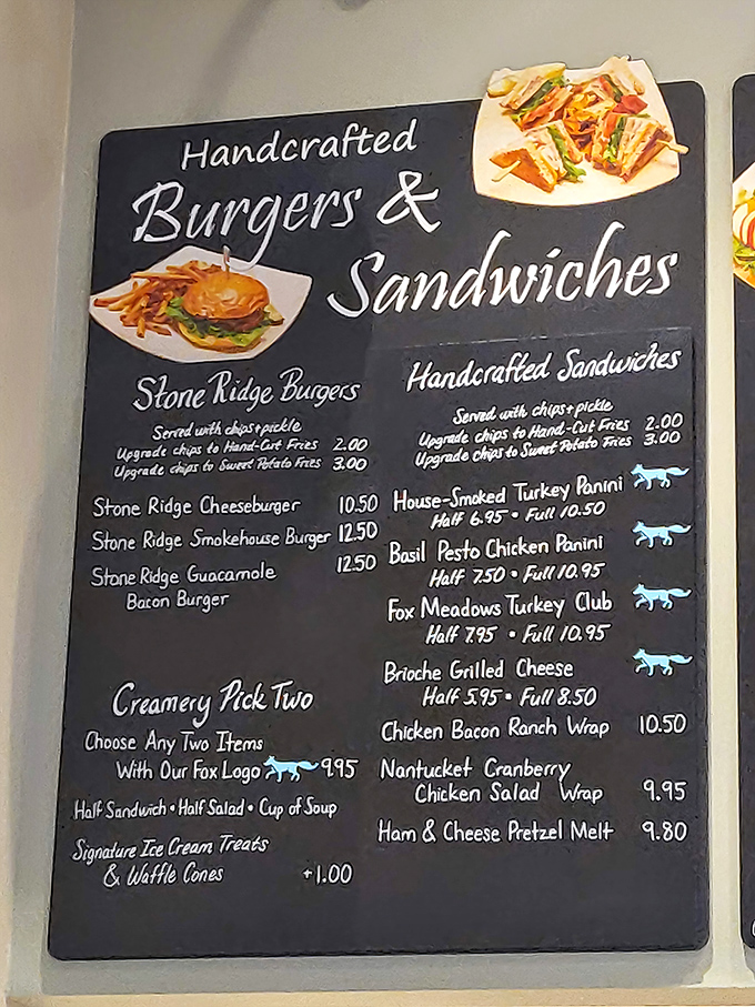 The menu board showcases farm-fresh burgers and sandwiches with clever fox icons marking signature items—a culinary roadmap to deliciousness.