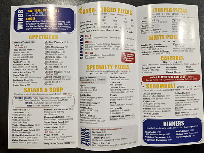 A menu that reads like a love letter to carbs. Pizza, stromboli, and those legendary cheesesteaks all competing for your affection on one glorious page.